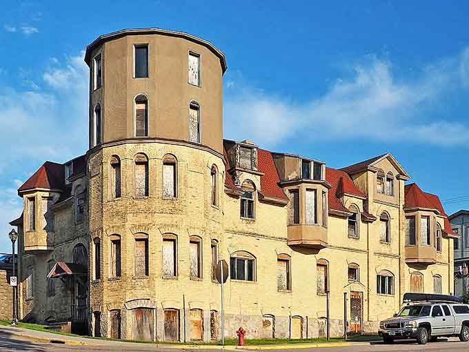 The "Castle" stands proud despite its emptiness, Tanner Hospital's yellow brick tower watching over Ely like a guardian from another era.