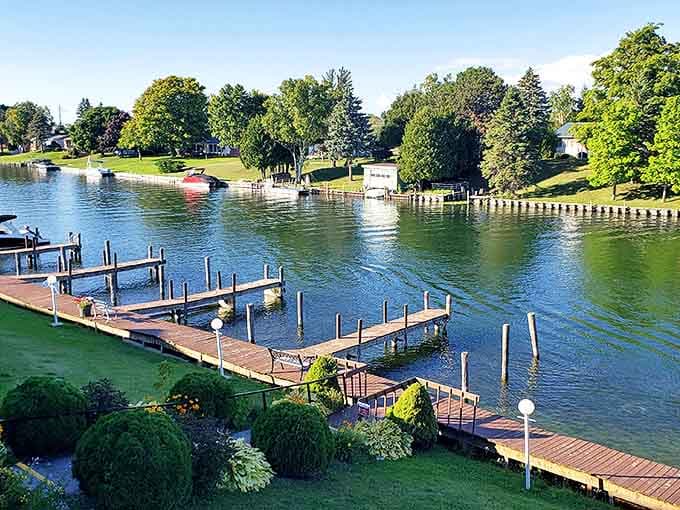 Waterfront homes and docks create a quintessential Michigan scene where land and water meet in perfect harmony.