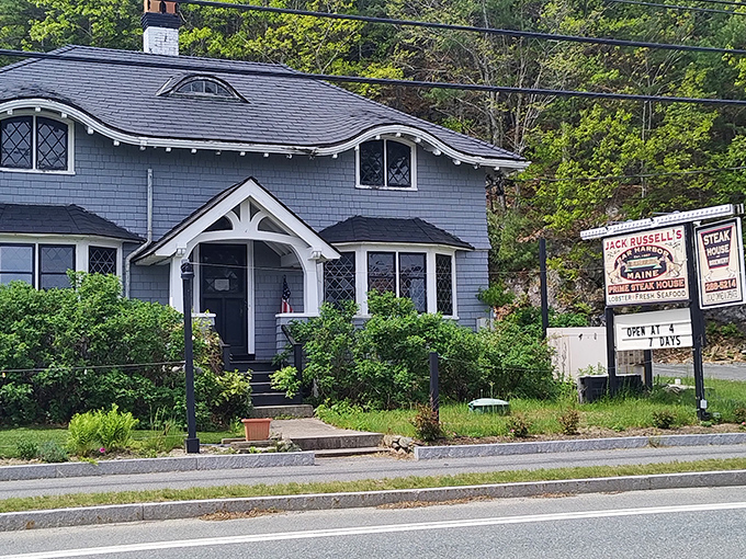 The charming blue-gray shingled exterior of Jack Russell's Steakhouse looks like a classic Maine coastal home, but inside awaits steak perfection.