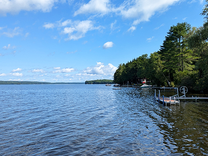 Fall colors frame Messalonskee Lake's crystal waters, creating a swimming experience that combines Maine's best features &ndash; foliage and pristine lakes. 
