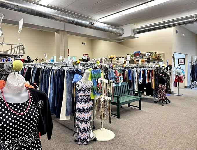 The clothing department at New Horizon Thrift Store offers a rainbow of options hanging neatly on racks, ready for their second life.