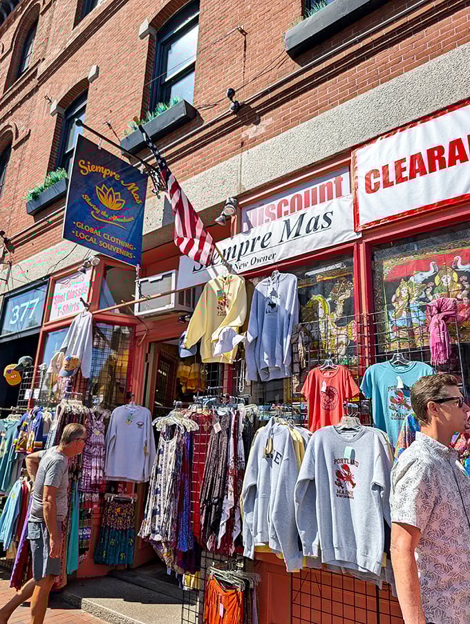 The vibrant storefront of Siempre Mas stands out among Portland's brick buildings, promising global treasures and one-of-a-kind finds.