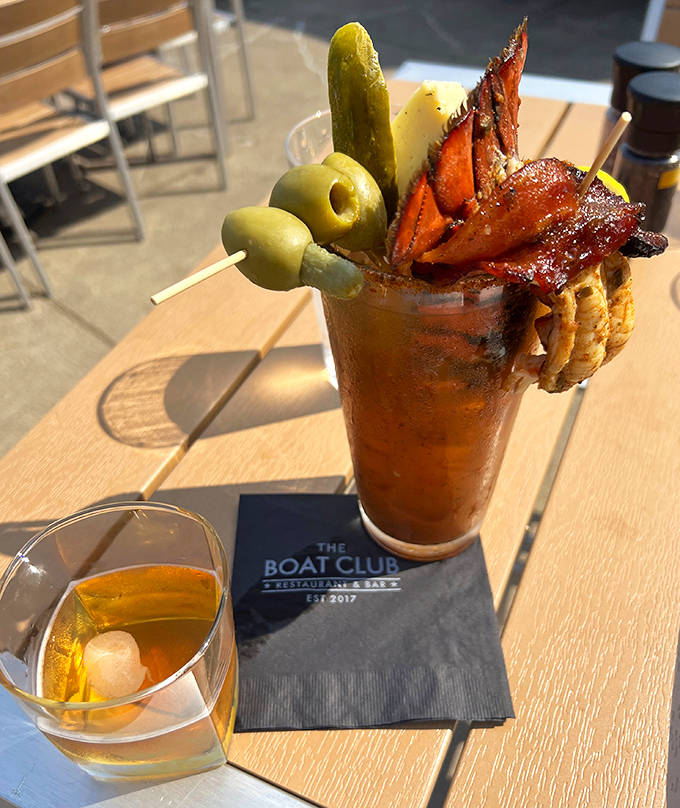Not just a drink but an edible sculpture – this Bloody Mary comes armed with olives, pickle, and what appears to be bacon-wrapped seafood.