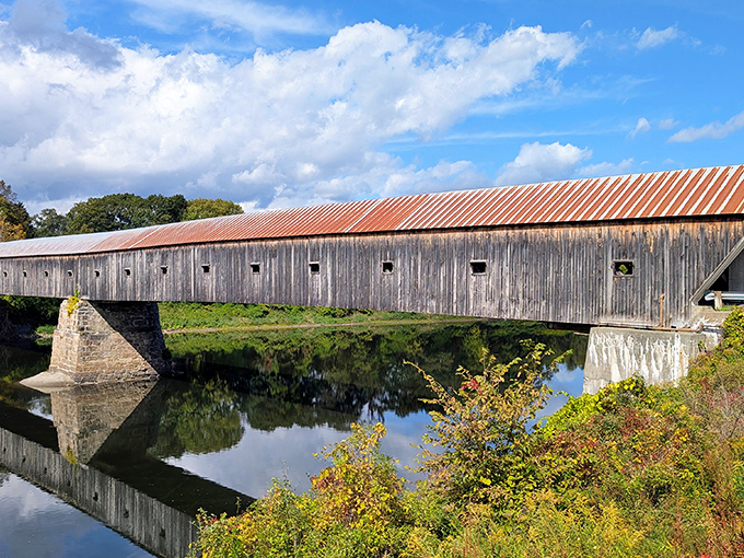 Mirror-like waters double the visual impact of this architectural marvel, creating perfect symmetry between structure and reflection.