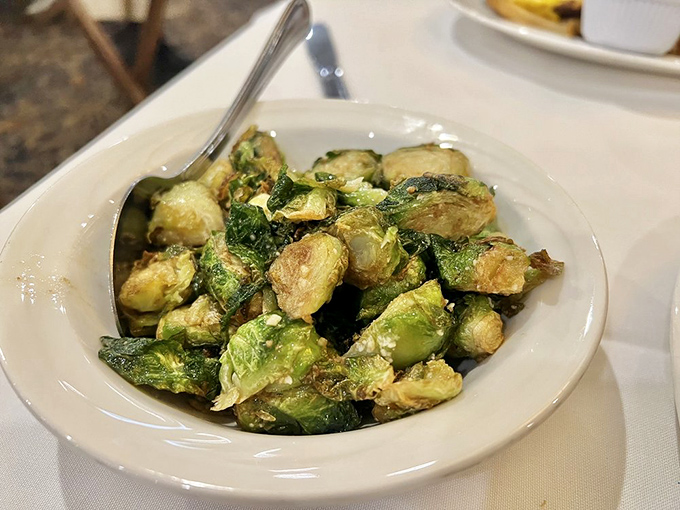 These aren't your childhood Brussels sprouts &ndash; caramelized to perfection, these little green gems might just steal the spotlight from the famous chicken.
