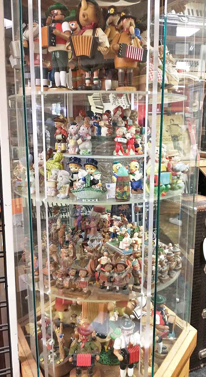 Whimsical figurines of accordion players fill glass cases throughout the museum, their frozen melodies a testament to the instrument's cultural impact.