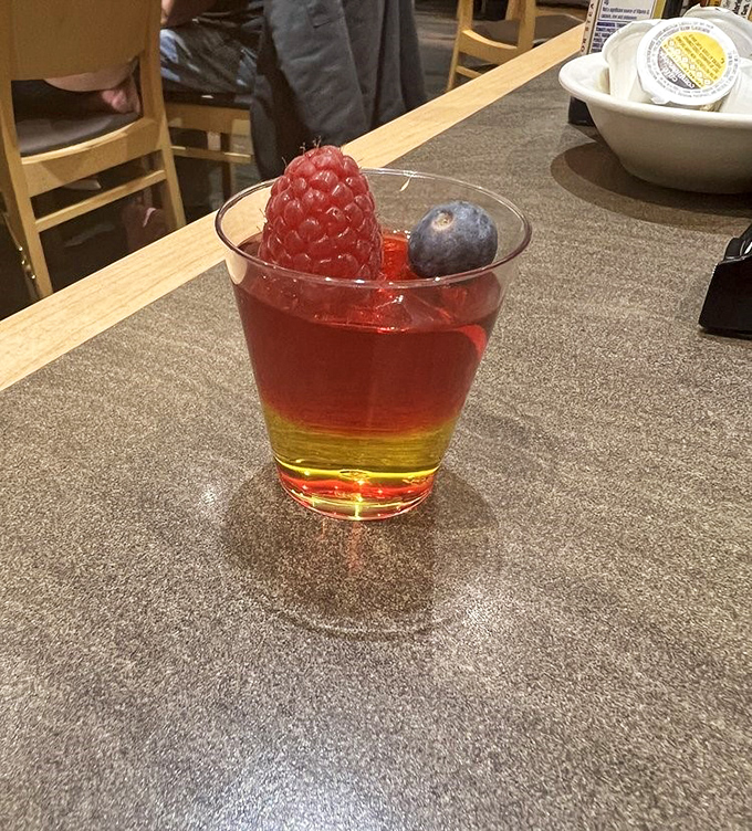 Layered parfait perfection – this colorful concoction of jelly, custard and fresh berries proves that sometimes the prettiest desserts taste the best.