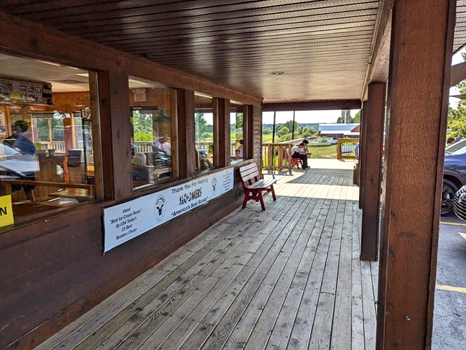 The covered porch offers shelter from summer sun while you contemplate life's important questions, like "Should I get seconds?" (Spoiler: Yes, always yes.)