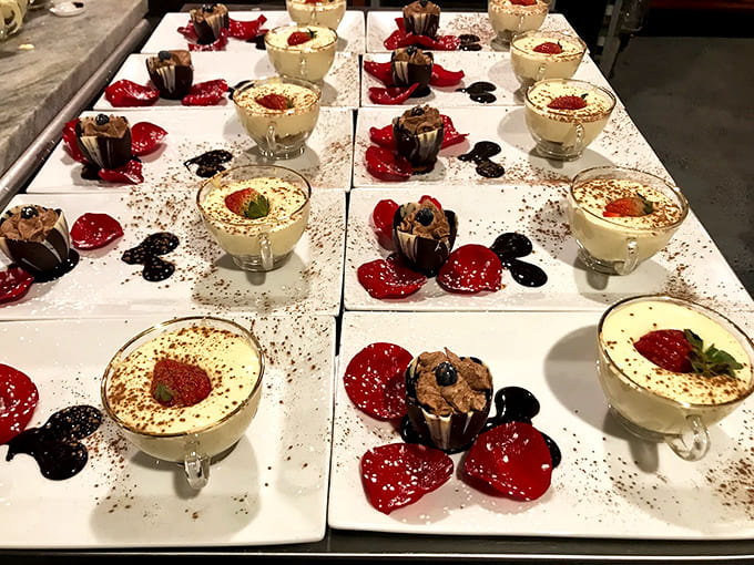 Desserts arrive looking like edible art installations, the kind that make you pause before destroying them with your fork.