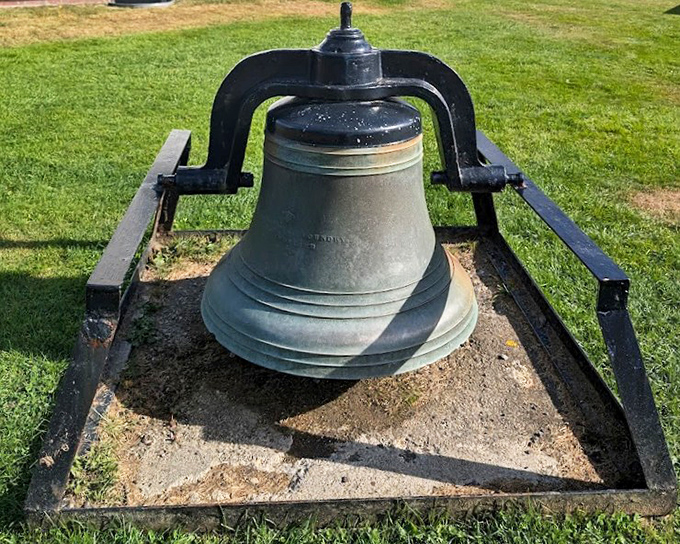 Maritime guardian: The lighthouse bell once rang through fog and storm, a lifesaving sound for countless sailors navigating treacherous waters.