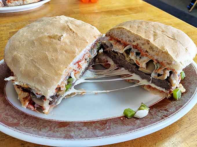 Witness the perfect cheese pull! This sandwich demonstrates why sometimes the simplest pleasures are the most satisfying.