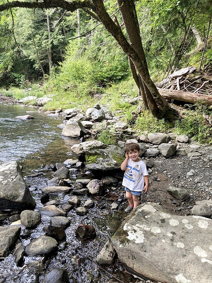 Young explorers discover a world without screens, where rocks and water provide entertainment more captivating than any video game.