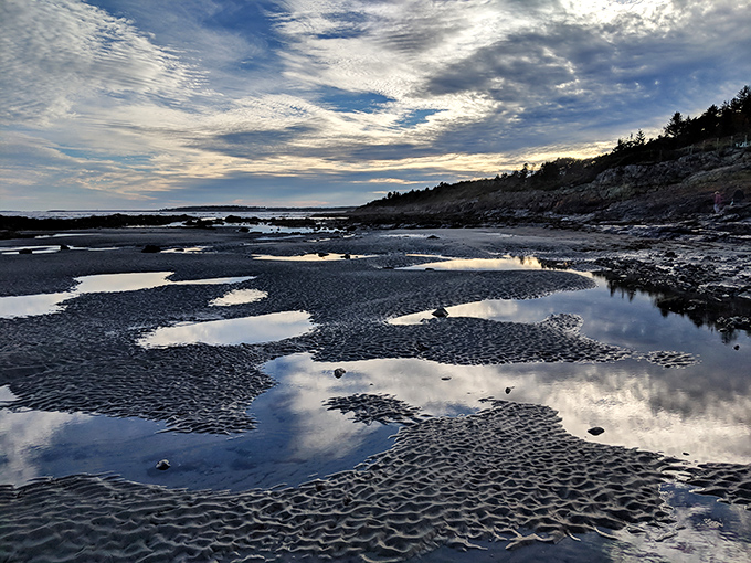 Sandy ripples mirror cloud patterns above &ndash; Maine's beaches write poetry in patterns only nature could design.