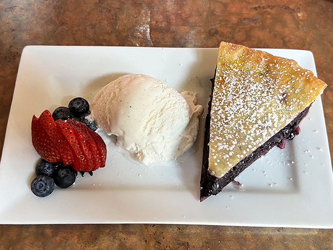 Maine blueberry pie with vanilla ice cream &ndash; where tiny wild berries pack more flavor punch than seems physically possible. Resistance is futile.