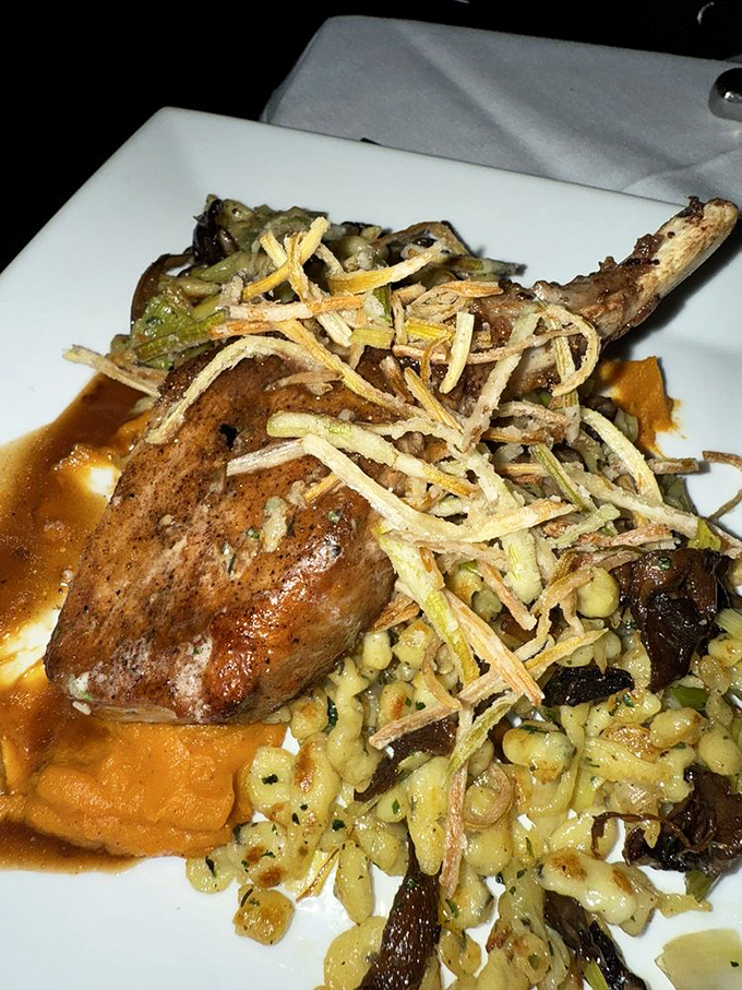 Maplewood smoked pork loin with crispy garnish &ndash; Vermont's agricultural heritage transformed into a dish worth savoring slowly.