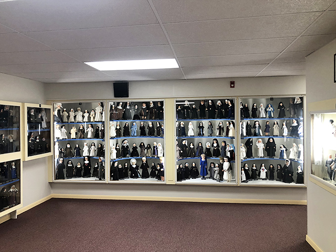 The expanded nun doll collection showcases hundreds of orders, each tiny figure representing distinct traditions, missions, and histories.