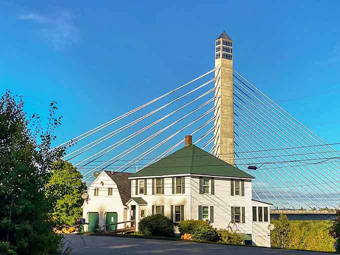 The bridge rises from the landscape like Maine decided to build its own mini Golden Gate.