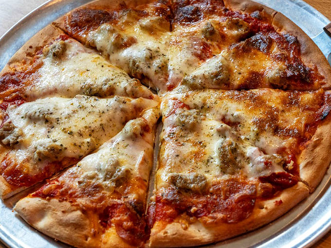 Pizza that proves The Brass Rail isn't a one-trick pony &ndash; that perfect cheese pull is the stuff of foodie dreams.