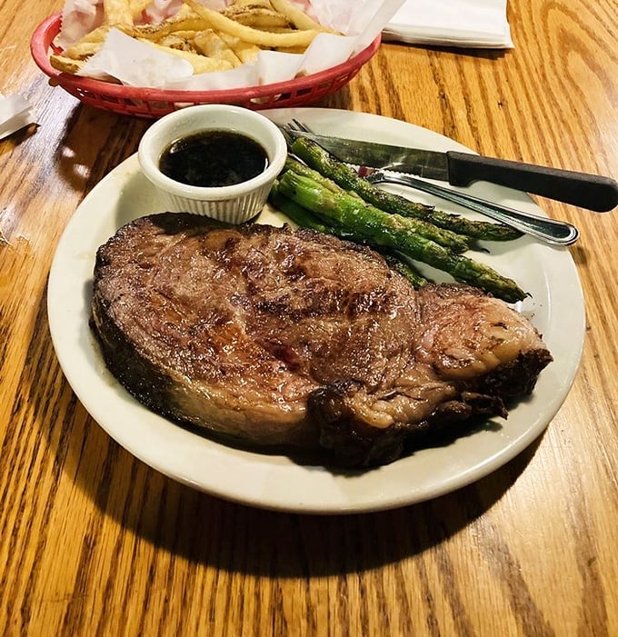 Prime rib cooked to perfection, accompanied by asparagus that actually makes you want to eat your greens.