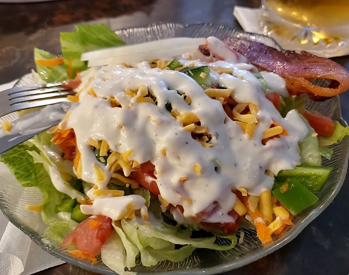 Even the salads don't skimp on indulgence, with fresh vegetables, shredded cheese, and that telltale bacon strip saying "you're still in Michigan."