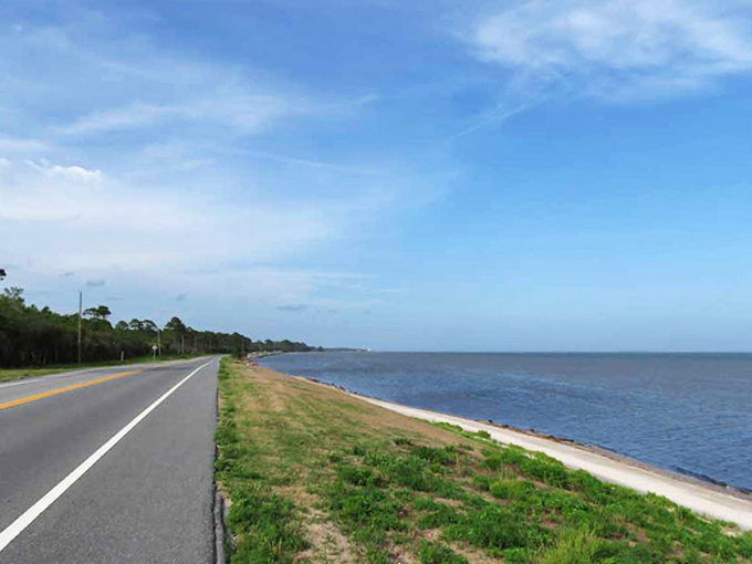 The seaside roadway hugs the coastline, offering drivers views that make it nearly impossible to keep eyes on the road.