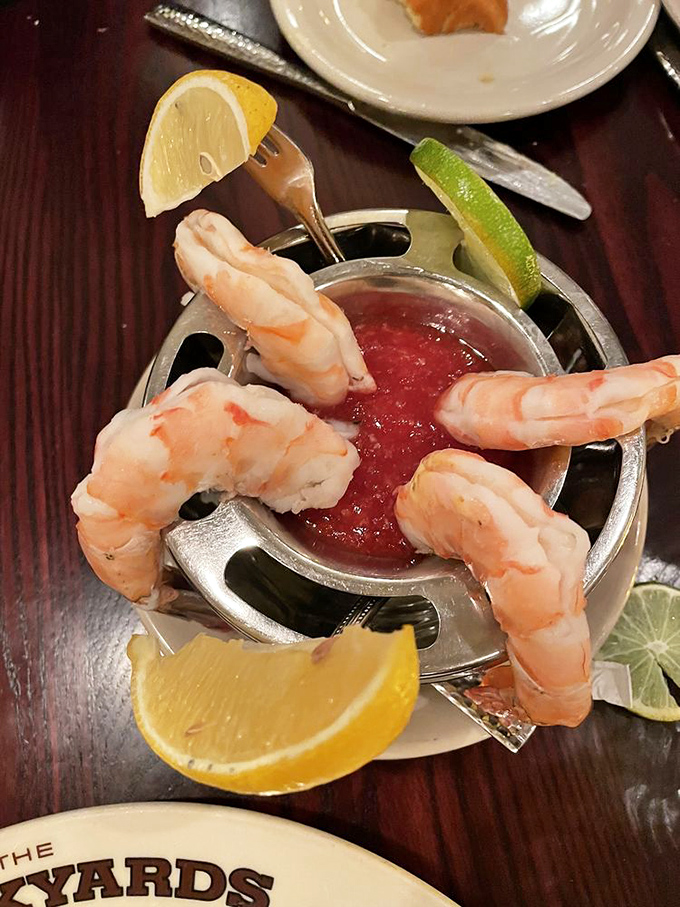 The shrimp cocktail isn't just an appetizer; it's an announcement that seafood in the desert can indeed be spectacular.