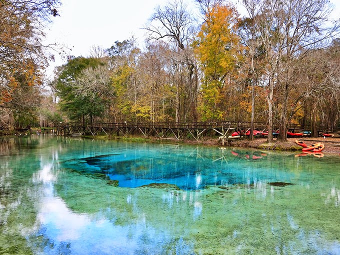 Autumn transforms the springs into a painter's palette, where fiery foliage meets impossible blue in nature's perfect contrast.