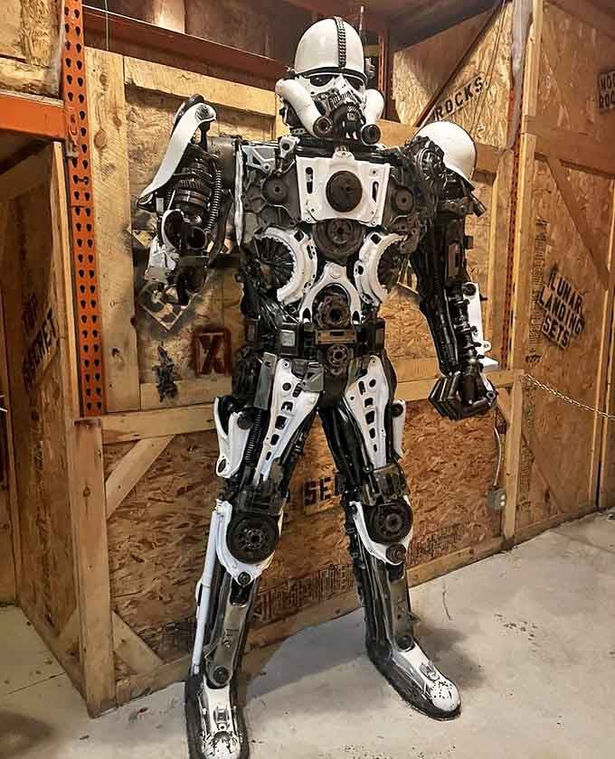 This imperial trooper constructed from automotive parts stands at attention, a creative upcycling masterpiece that bridges science fiction and sculpture.