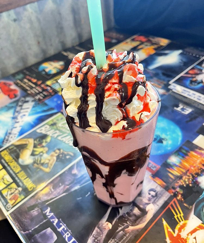 This magnificent creation isn't just a drink – it's dessert architecture, with whipped cream peaks and chocolate valleys.