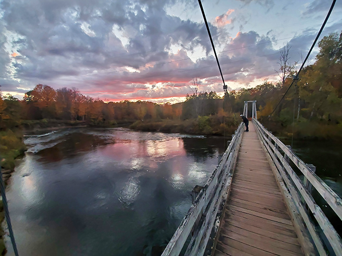 Twilight transforms the ordinary into the extraordinary as the day's final light paints both sky and water in impossible shades of pink and gold.