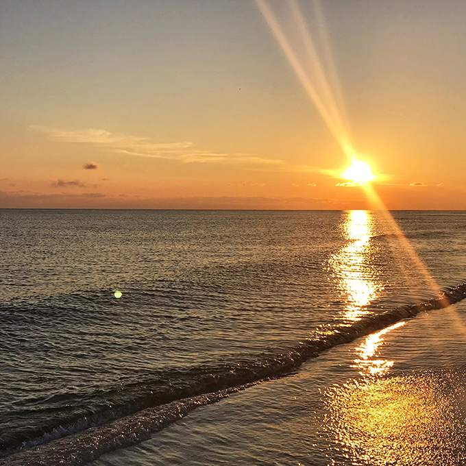 Sunset painters the water with liquid gold &ndash; the nightly show that never gets old and always earns a standing ovation.
