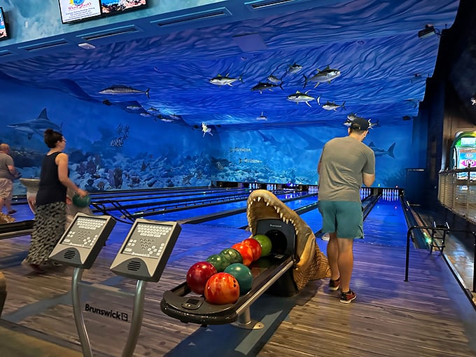 Where else can you roll strikes while sharks and marlins keep score from above?