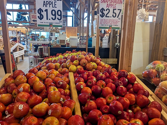 Apple mountains so perfectly stacked, you'd feel guilty disturbing them if they didn't look so deliciously tempting.