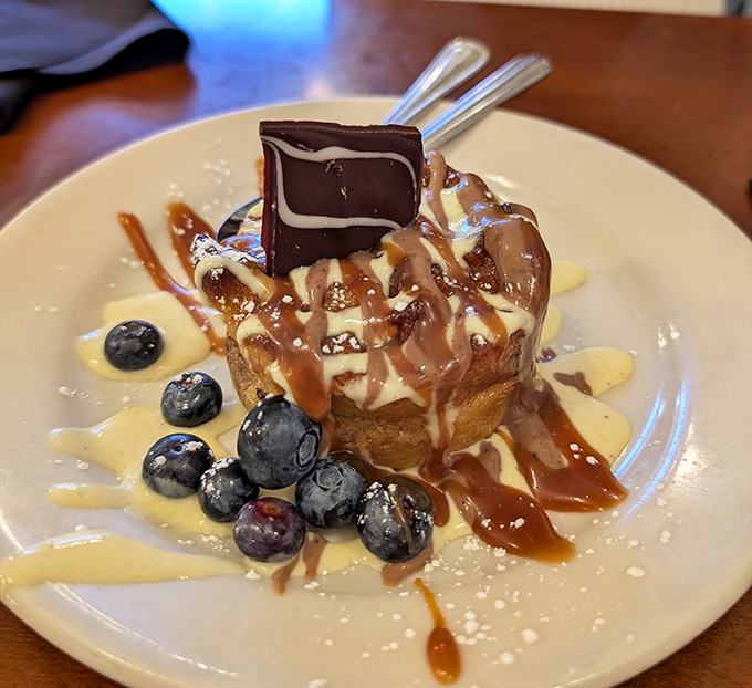 Bread pudding that makes you close your eyes involuntarily &ndash; warm, decadent, and topped with berries that add just the right bright notes.