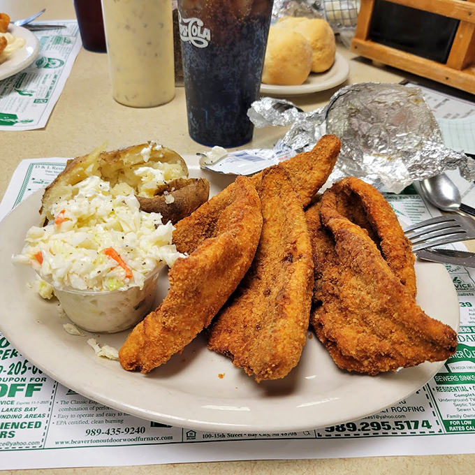 Golden-fried perfection that makes you wonder if mermaids might swim upstream just for a taste of this crispy catch.