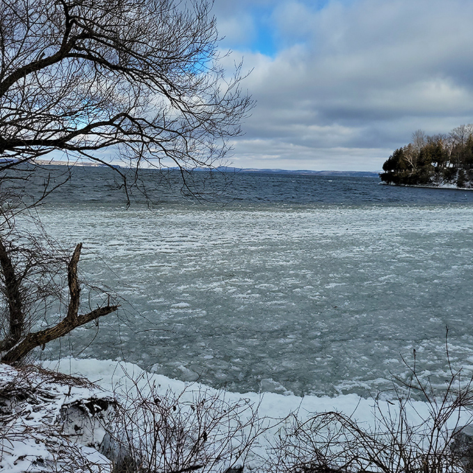 Winter transforms the causeway into a frosty wonderland, where brave souls find solitude and crystalline beauty.