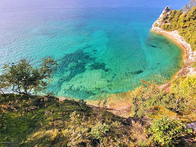 From this bird's-eye perspective, Lake Superior's waters shift between emerald and sapphire, a color palette that would make any Caribbean island turn green with envy.