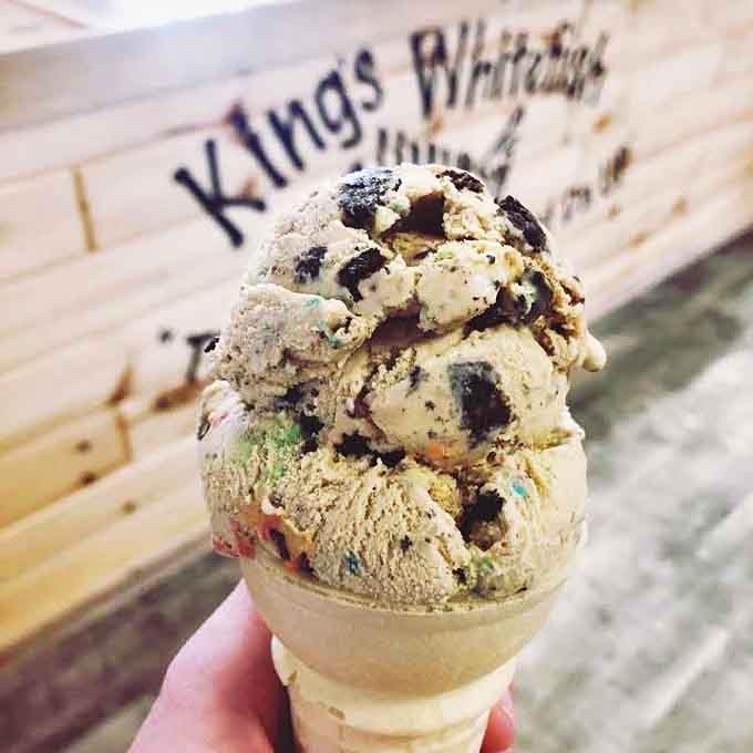 A towering scoop of creamy ice cream studded with mix-ins &ndash; the sweet finale to a savory Great Lakes feast.