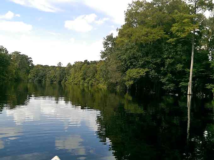 This lake reflects the sky so perfectly you might forget which way is up, which is fine because you're not in a hurry anyway.