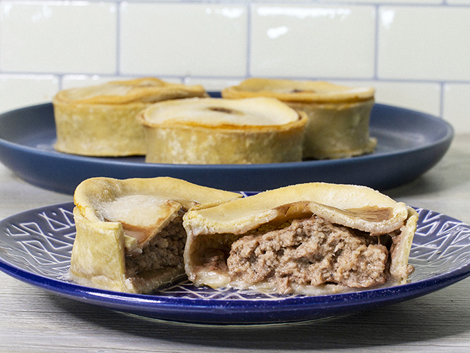 The legendary meat pie &ndash; a handheld feast of seasoned goodness wrapped in golden pastry.