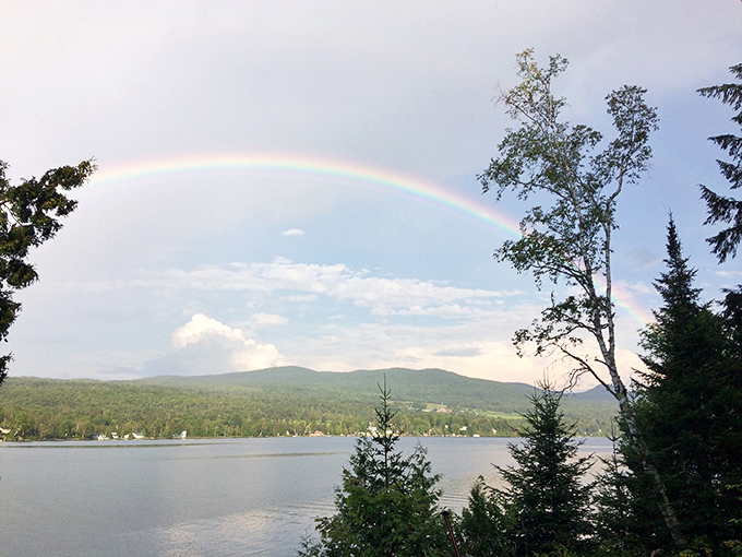 Double rainbow over Lake Willoughby because apparently regular beauty wasn't enough and nature decided to add bonus special effects for free.