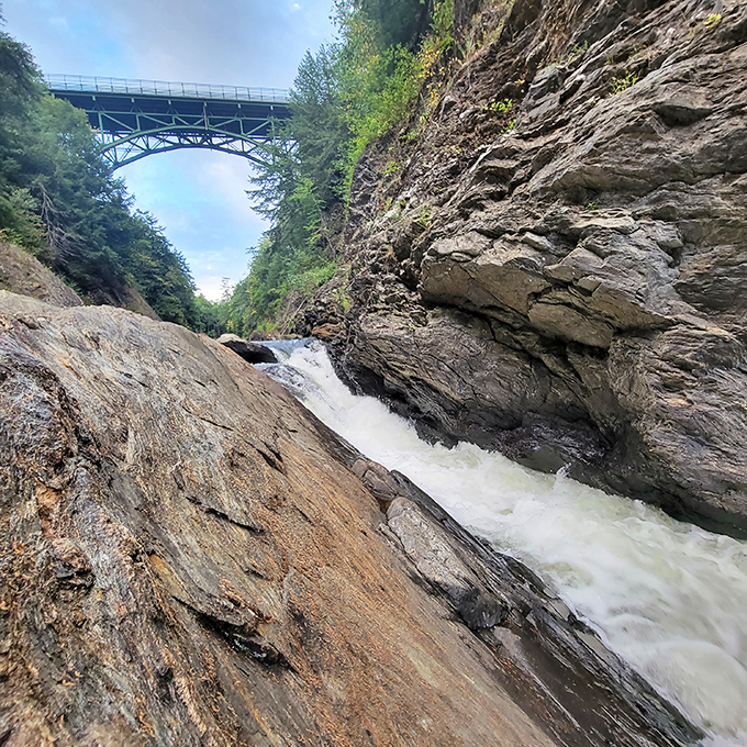 White water churns dramatically through narrow passages, a reminder of nature's raw power that shaped this landscape long before humans arrived.