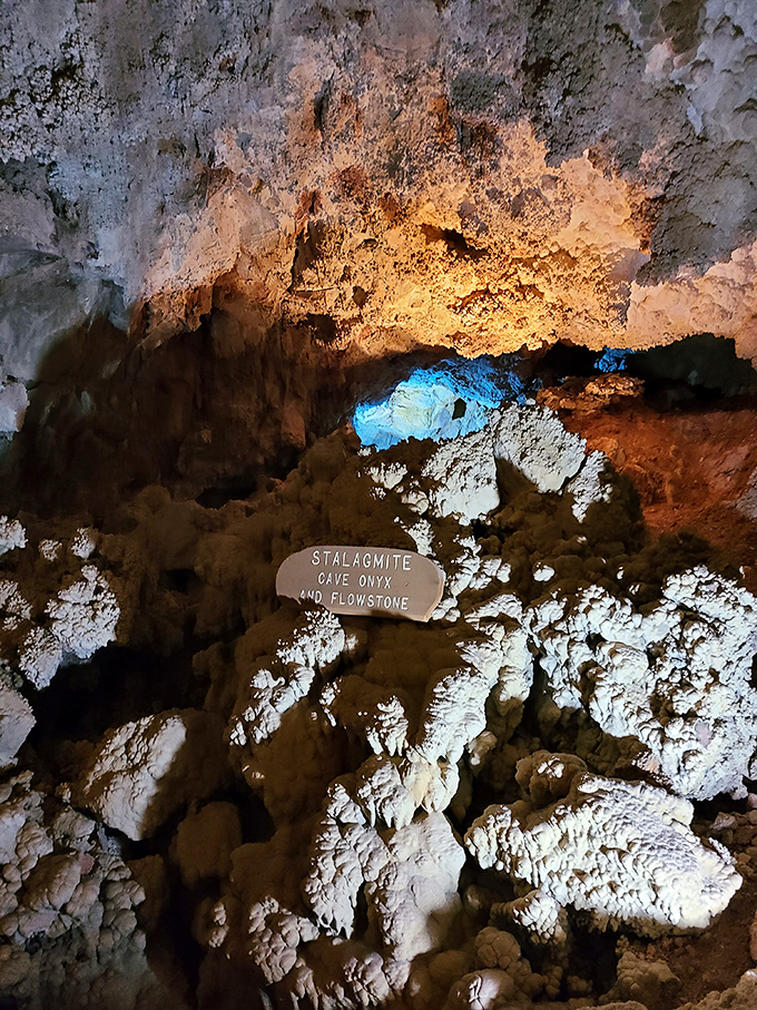 Stalactites and cave onyx create a frozen waterfall effect, despite the caverns being among the driest in the world.