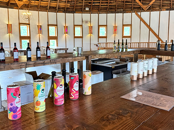 Tasting room temptations: Wooden beams frame this beverage wonderland where colorful cans of wine spritzers add a modern pop to the rustic setting.