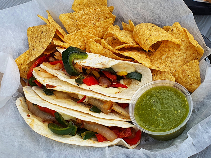Simple yet sublime – house-made tortilla chips with salsa verde that's bright enough to make your taste buds stand at attention.