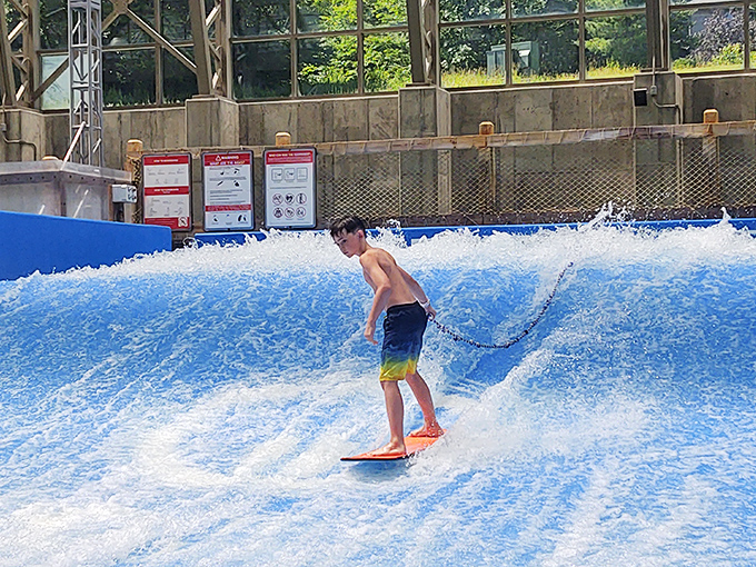 Surf's up in Vermont! The FlowRider creates perfect waves for landlocked surfers to hang ten while snow falls just beyond the glass.
