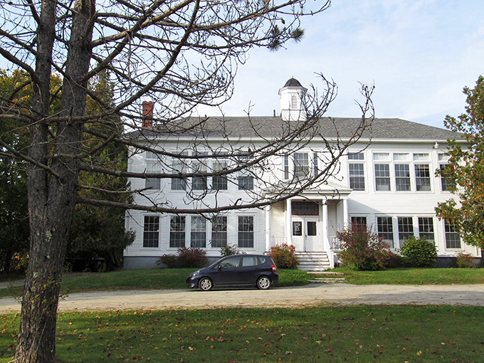 Brooklin's elegant main street features historic homes and buildings painted in classic New England white with accents.