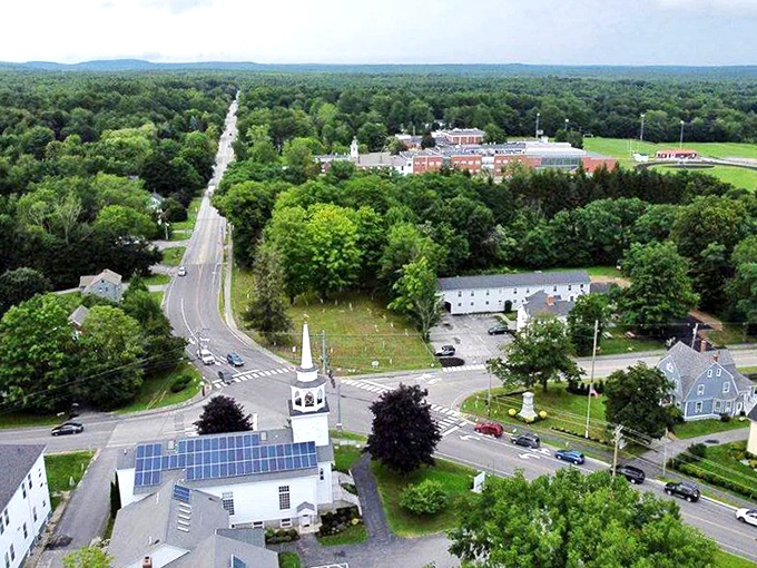Yarmouth's church steeples rise above tree-lined streets, creating the classic New England town skyline that time forgot.