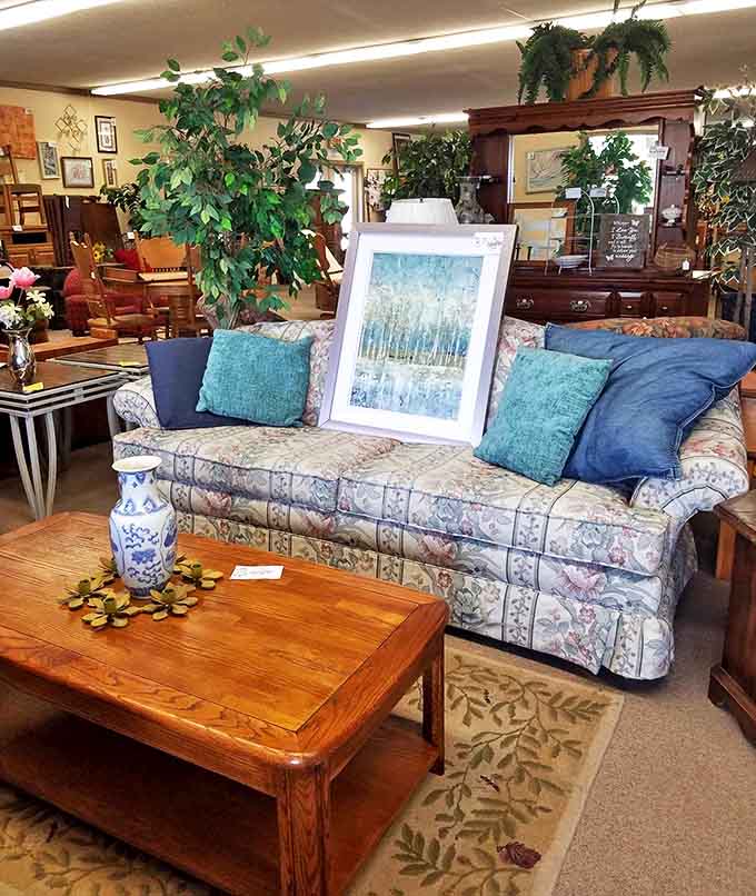 Heritage Thrift's furniture section showcases quality pieces with character, from patterned chairs to solid wood tables at prices that defy retail.