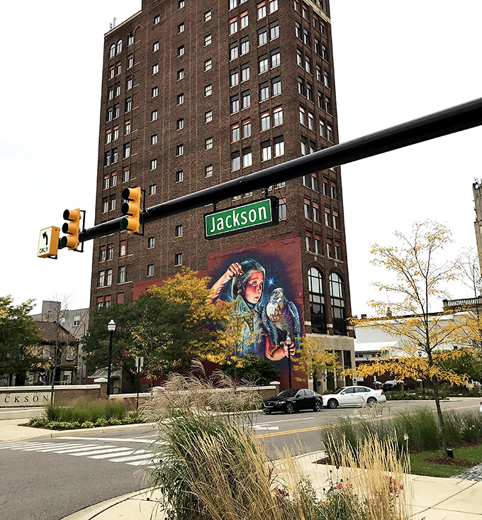 Jackson's historic buildings stand tall against the sky, with colorful murals adding artistic flair downtown.